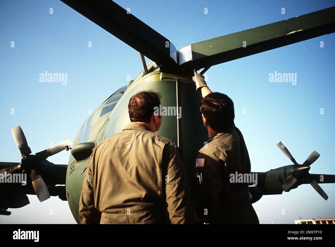 Members of the 7th Special Operations Squadron perform a preflight ...