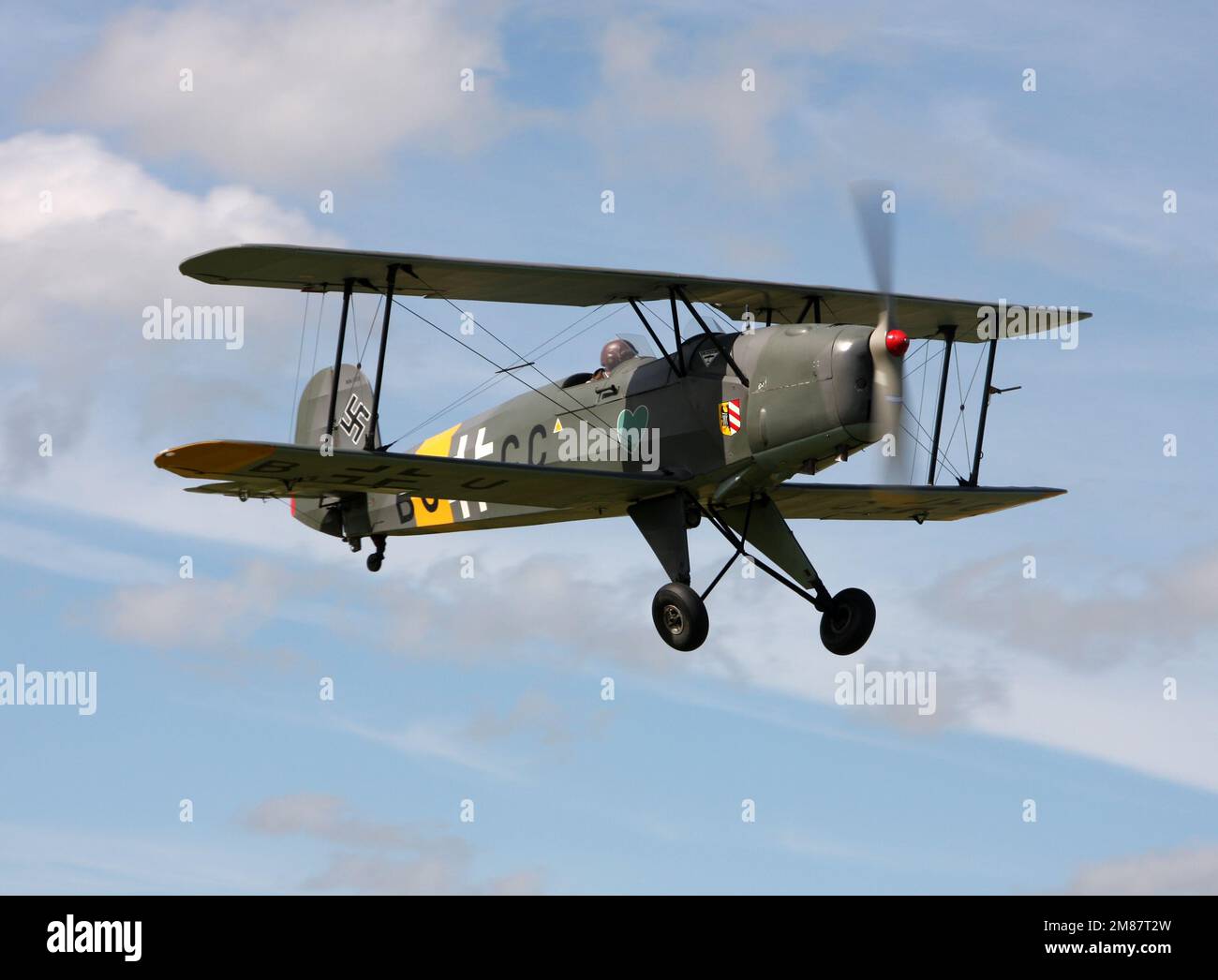 A Bücker 131 Jungmann on flypast at a private airfield in West Sussex ...