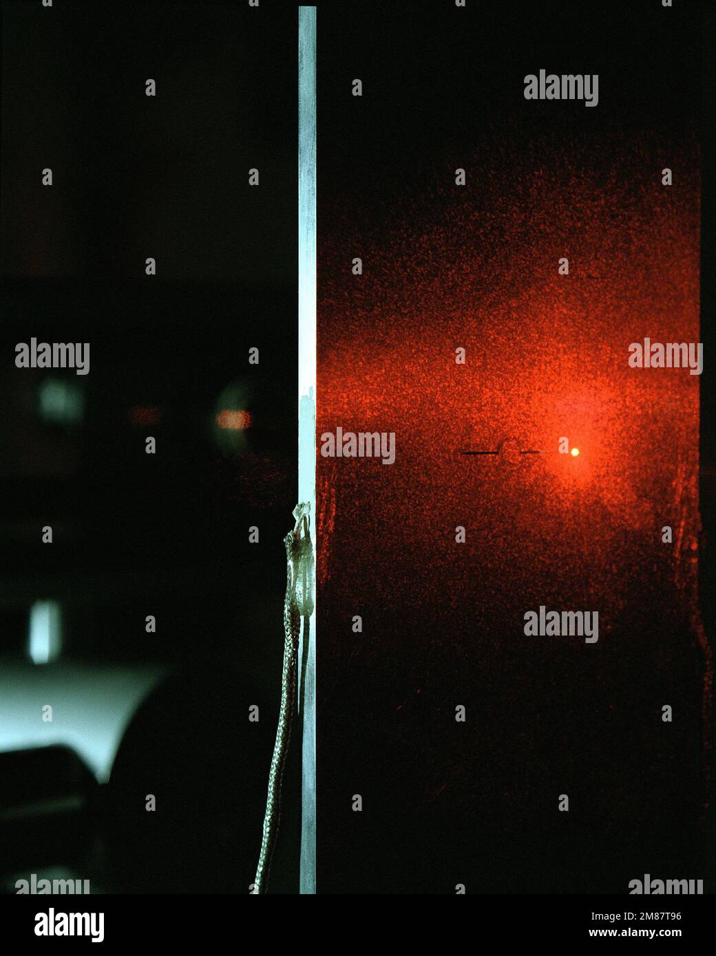 A laser beam is directed at a sheet of alloy during a test. The test is ...