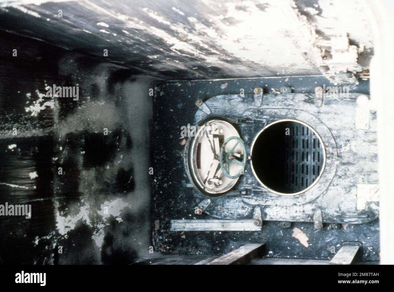 A view of damage sustained by the guided missile frigate USS STARK (FFG ...