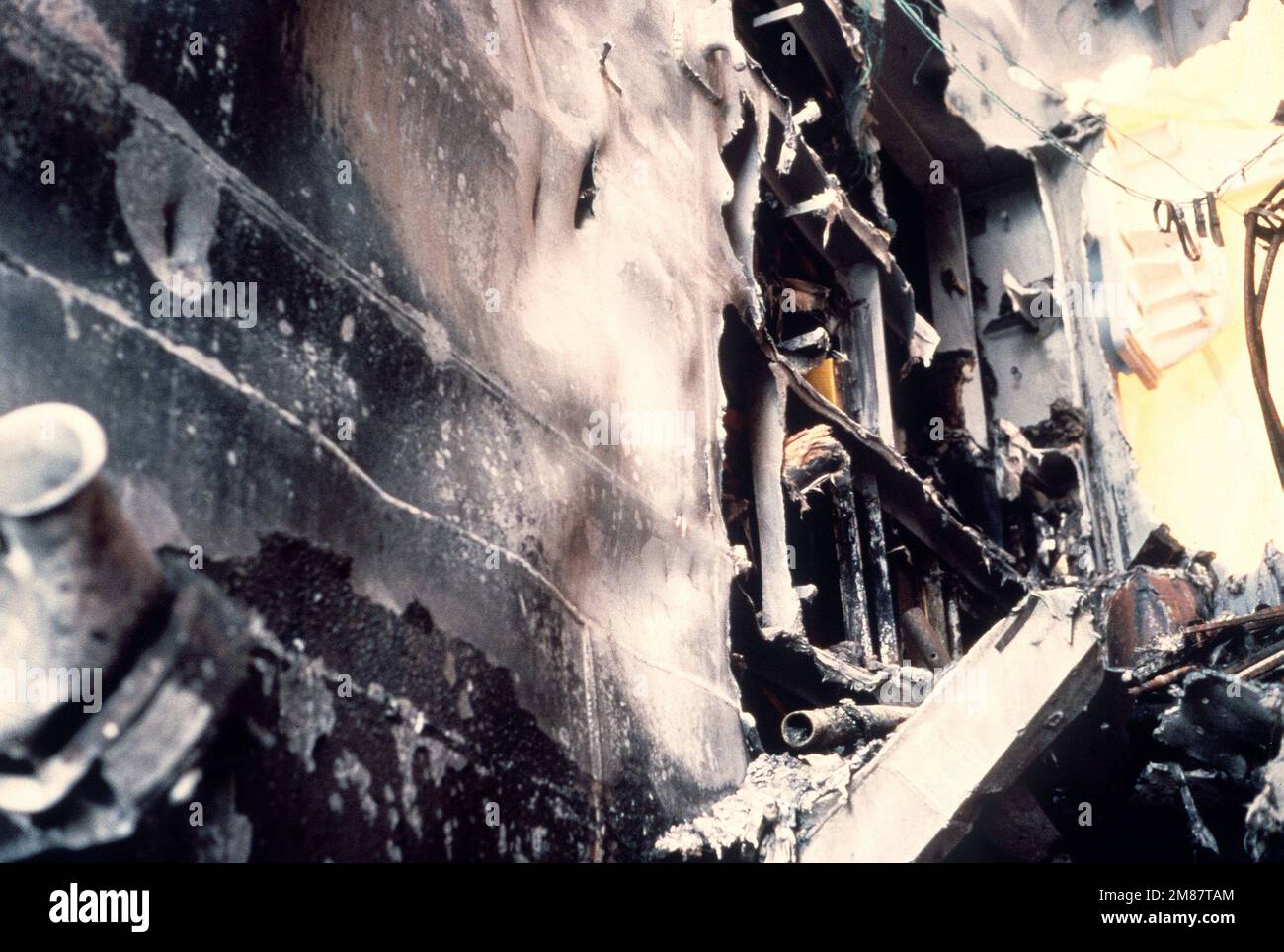 A view of damage sustained by the guided missile frigate USS STARK (FFG ...