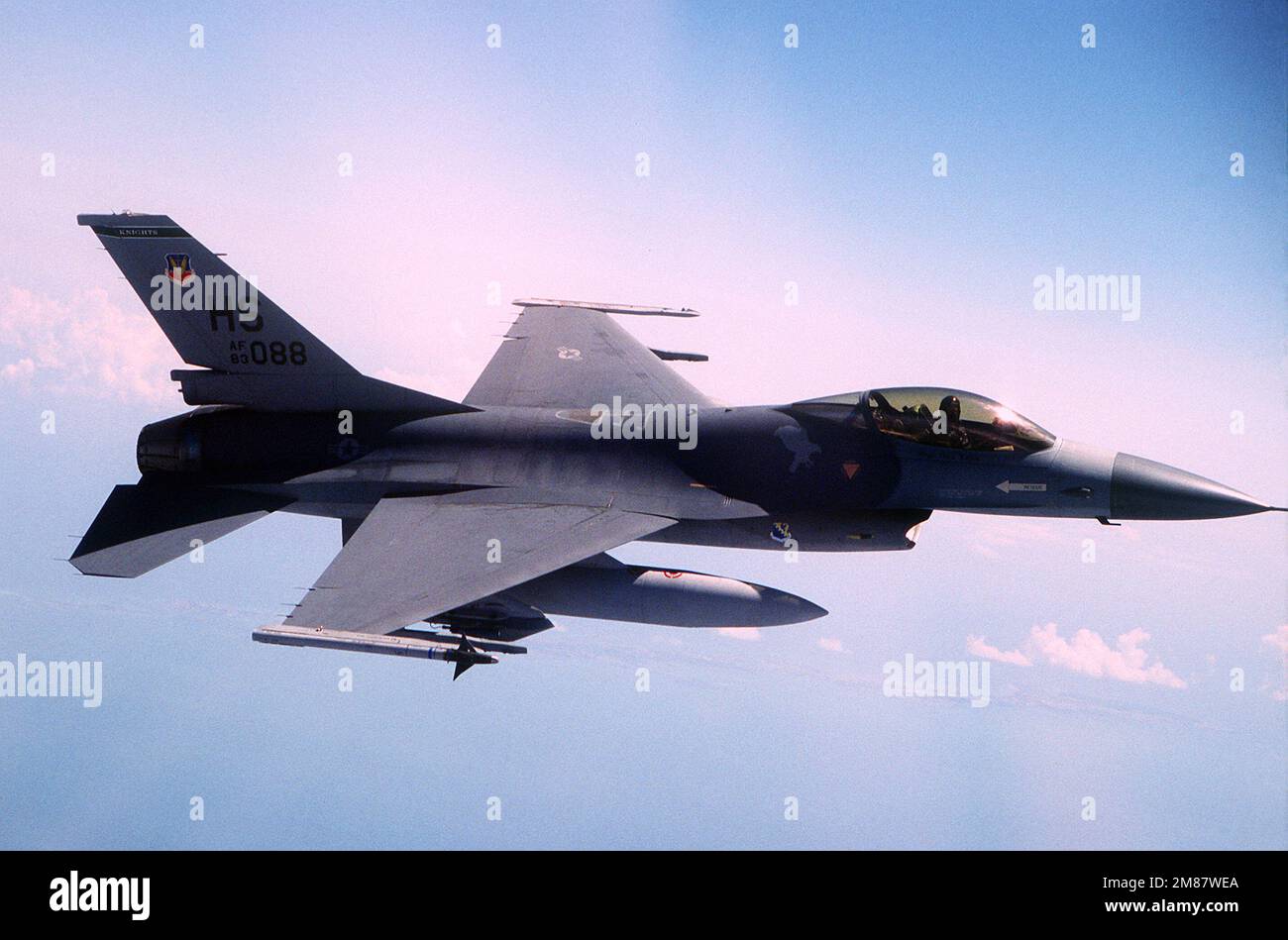 An air-to-air right side view of a 308th Tactical Fighter Training Squadron F-16 Fighting Falcon ...