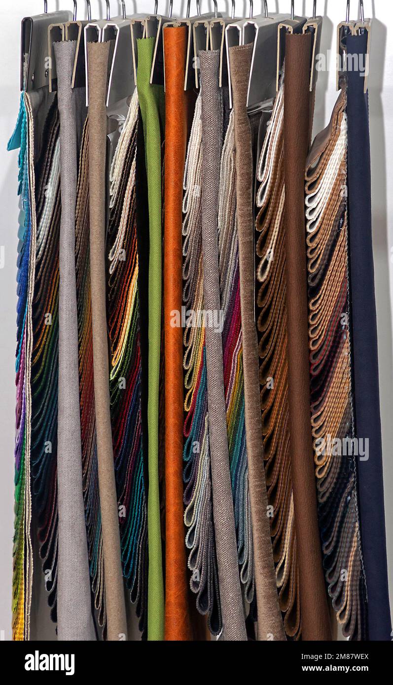 Material color samples and patterns hanging on a wall Stock Photo - Alamy