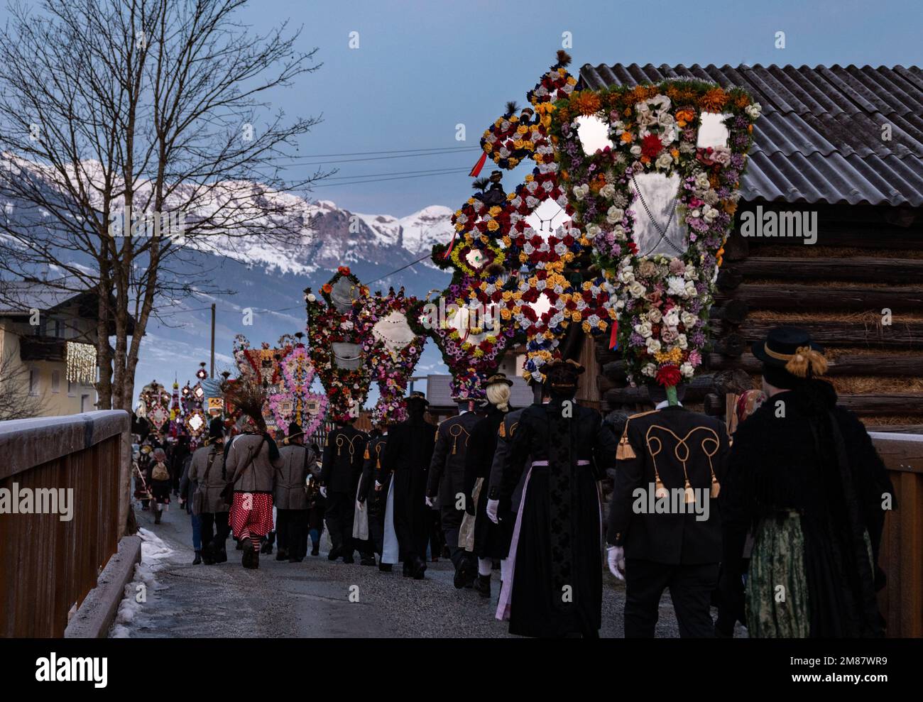 AUSTRIA, GASTEIN - January 1, 2023: Procession of perchten against the ...