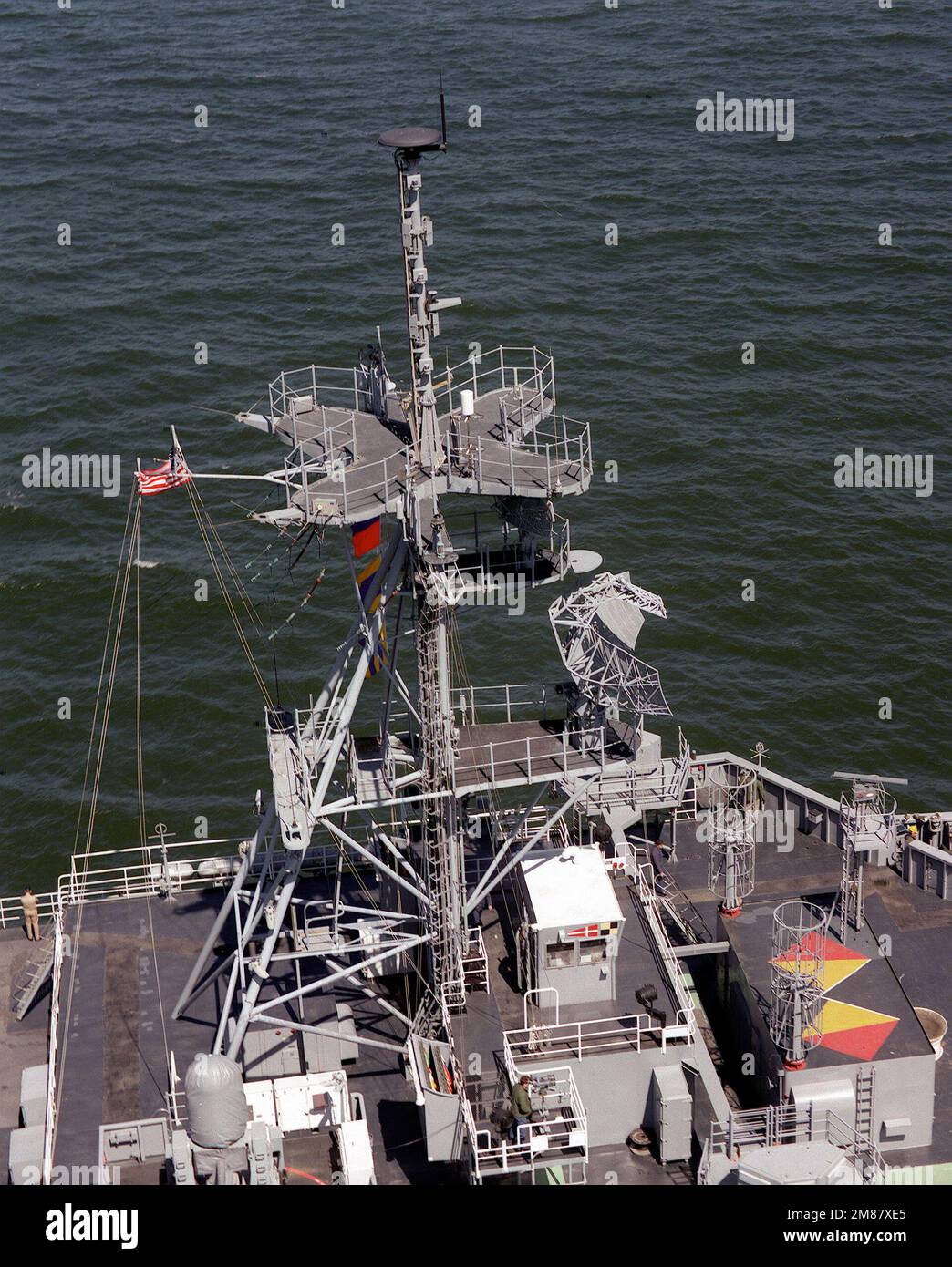 An amidships view of the antenna rigging on the mast of the amphibious ...