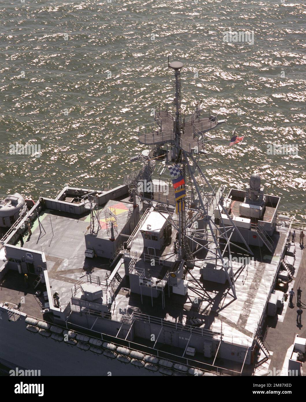An amidships view of the antenna rigging on the mast of the amphibious ...