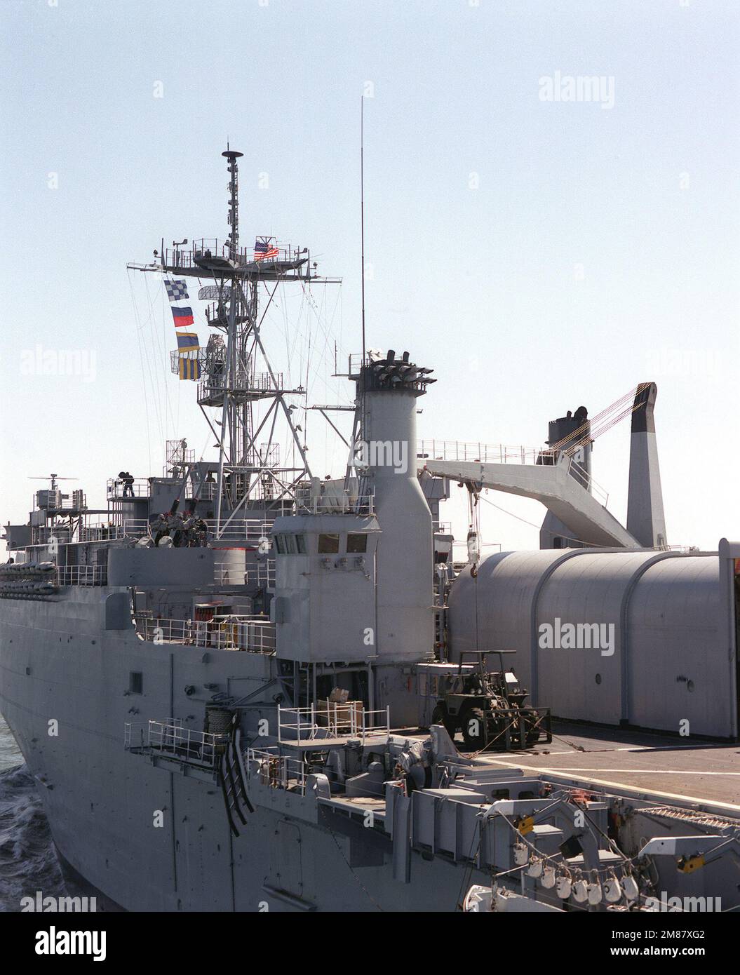 A port quarter view of the hangar bay and superstructure of the ...