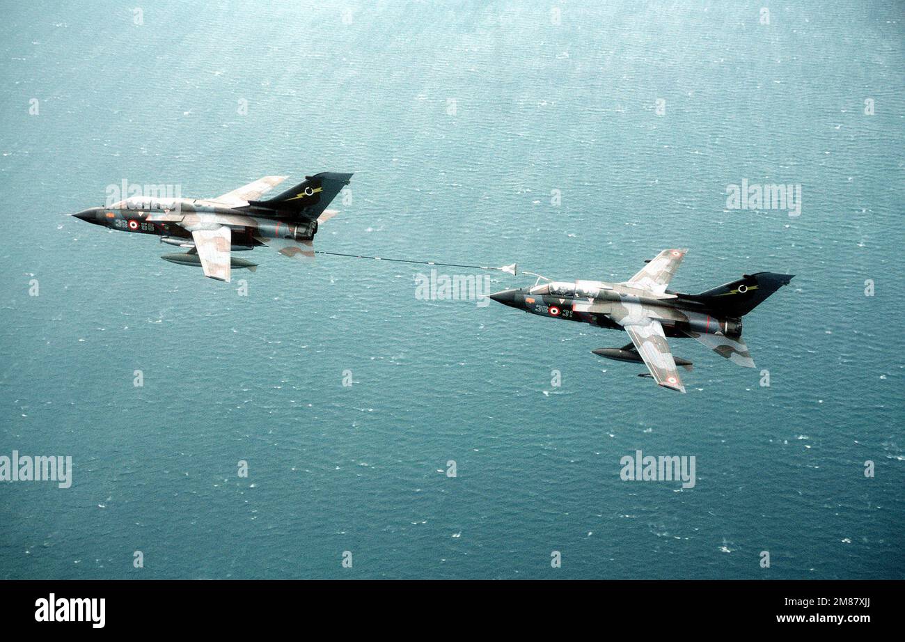 An Italian air force Tornado aircraft, right, approaches the refueling ...