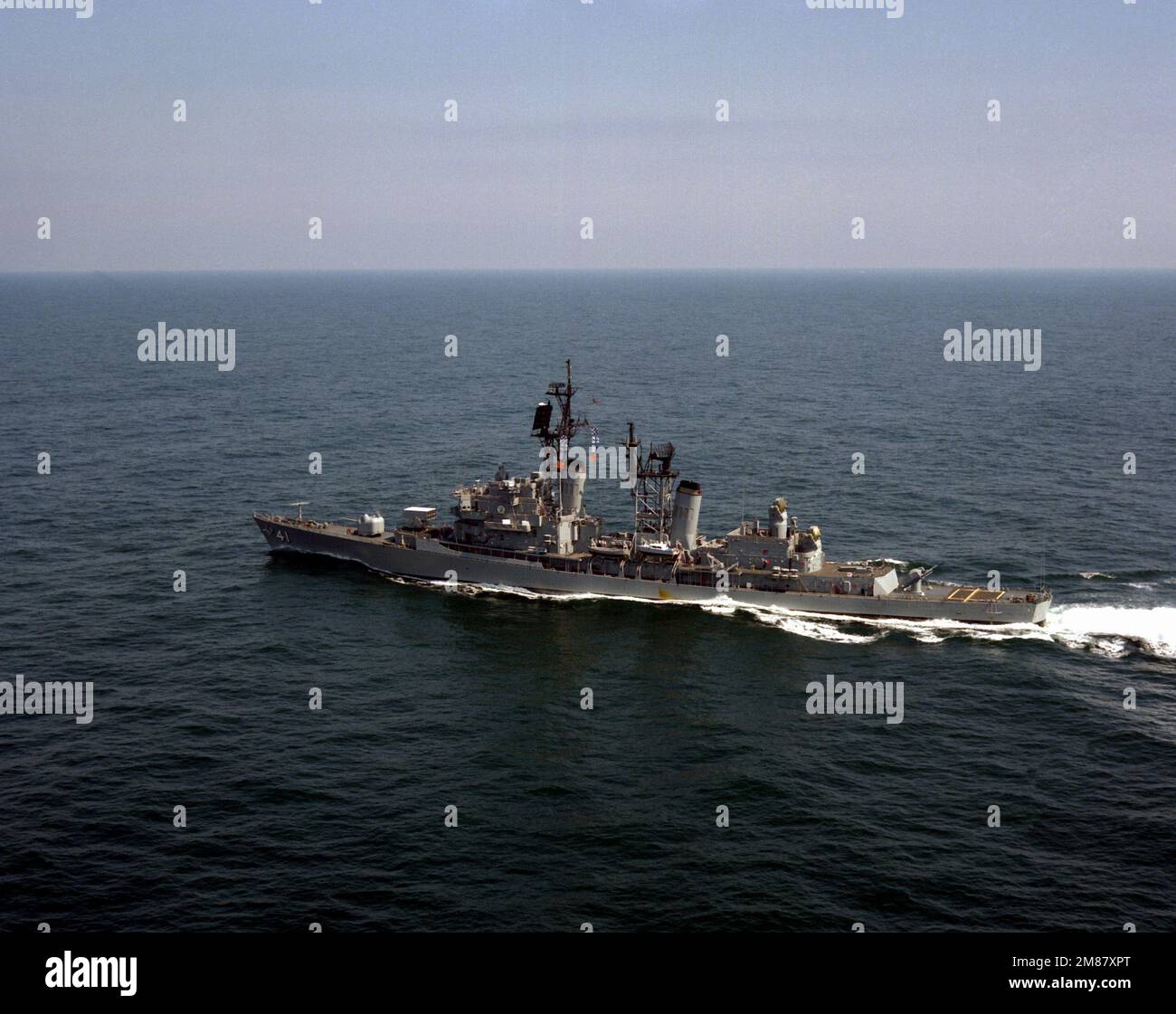 A port view of the guided missile destroyer USS KING (DDG-41) underway ...