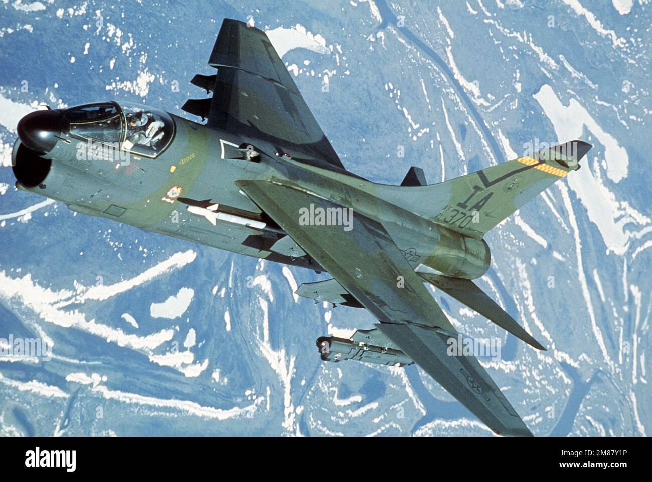 An air-to-air left front view of an A-7D Corsair II aircraft of the ...