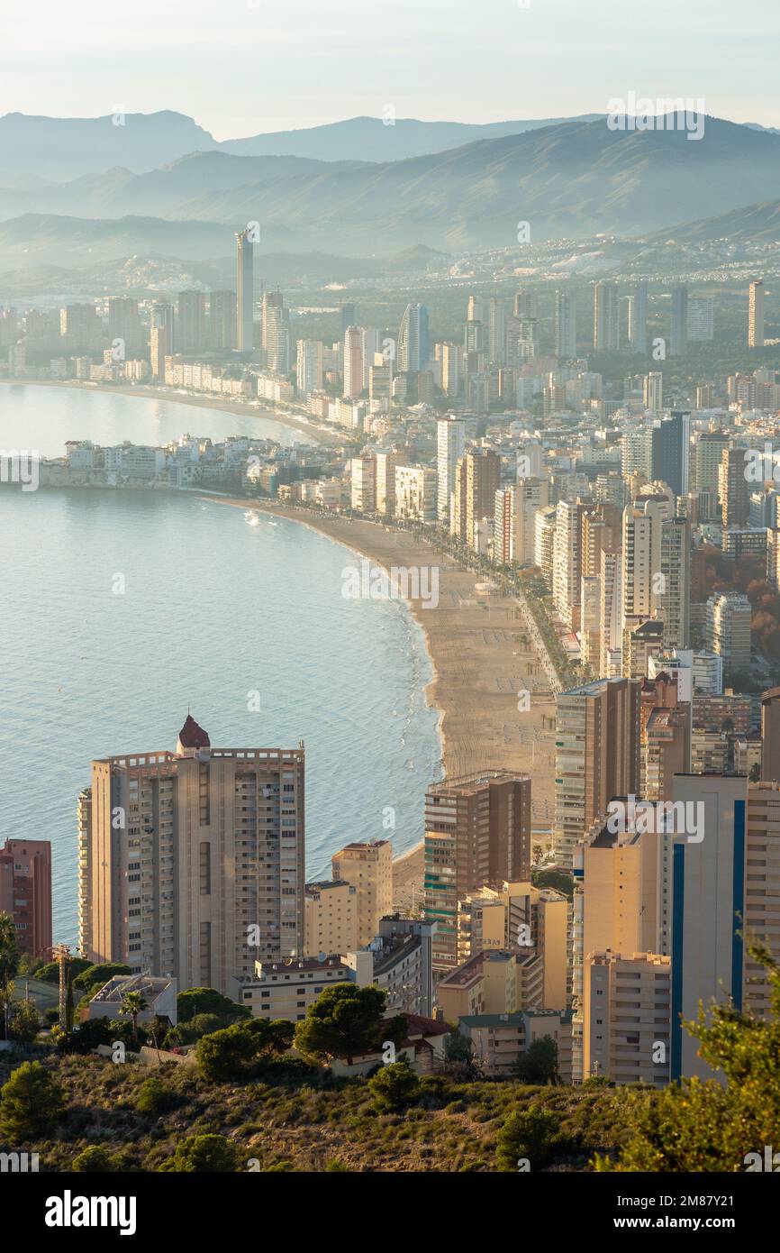 The city of Benidorm at sunset seen from Benidorm Cross Stock Photo - Alamy