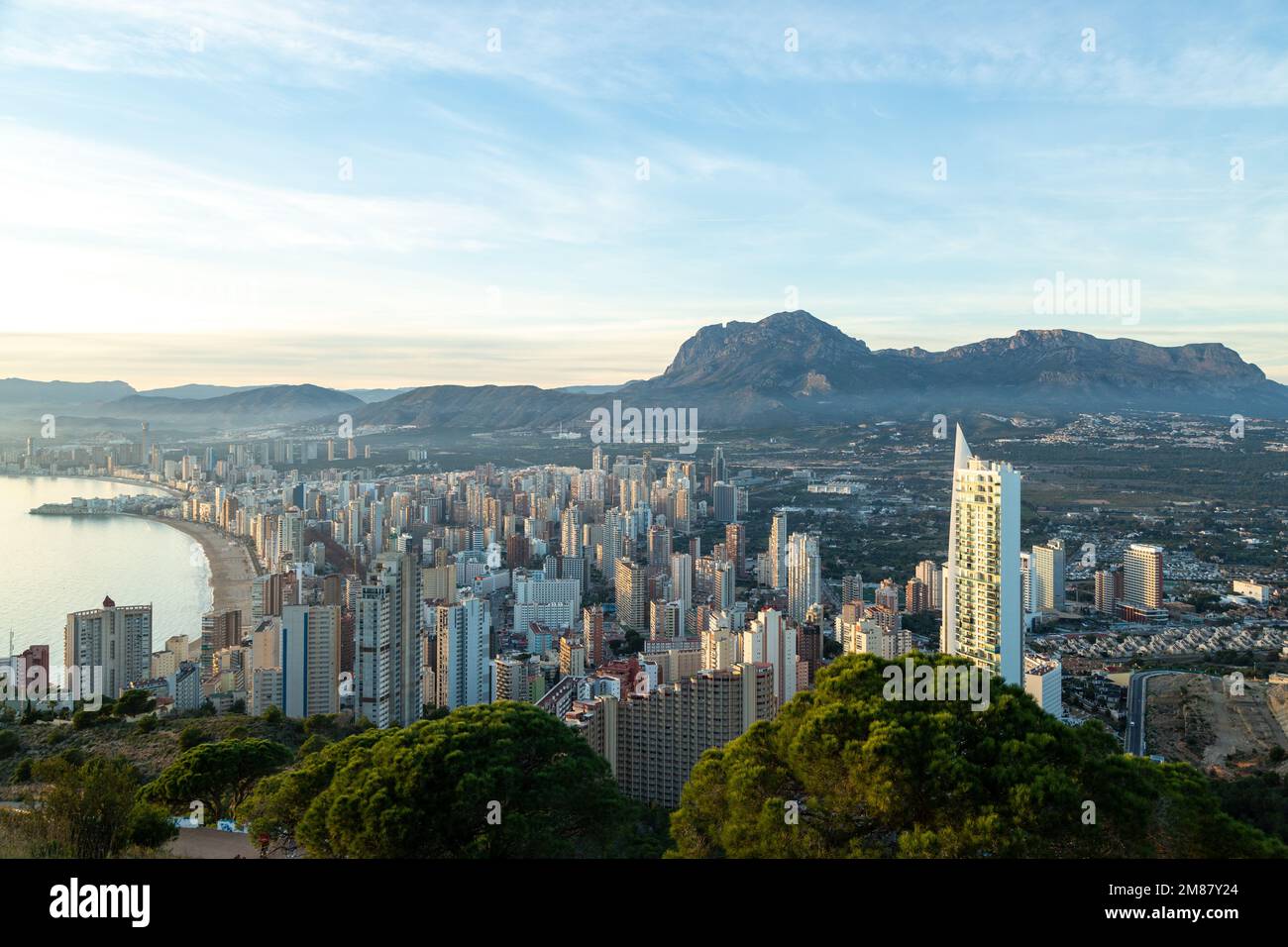 The city of Benidorm at sunset seen from Benidorm Cross with Puig ...