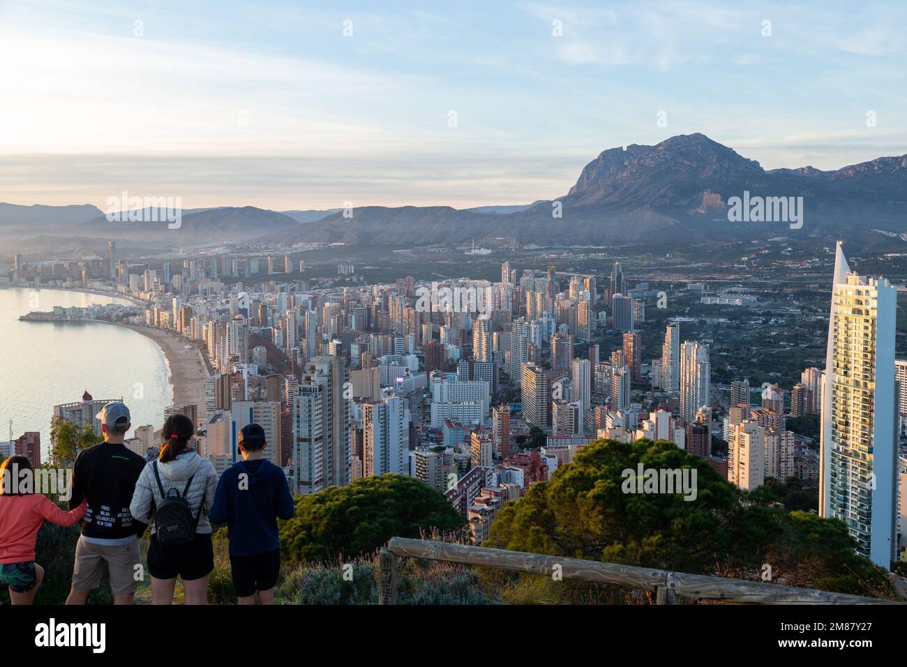 The city of Benidorm at sunset seen from Benidorm Cross with Puig ...