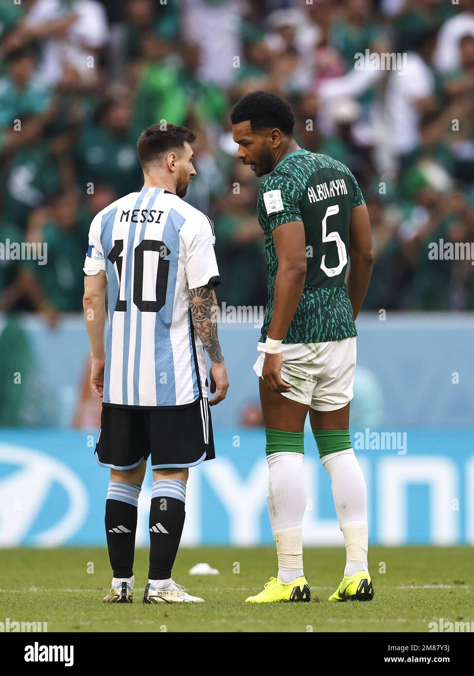 LUSAIL CITY - (LR) Lionel Messi of Argentina, Ali Al Bulayhi of Saudi ...