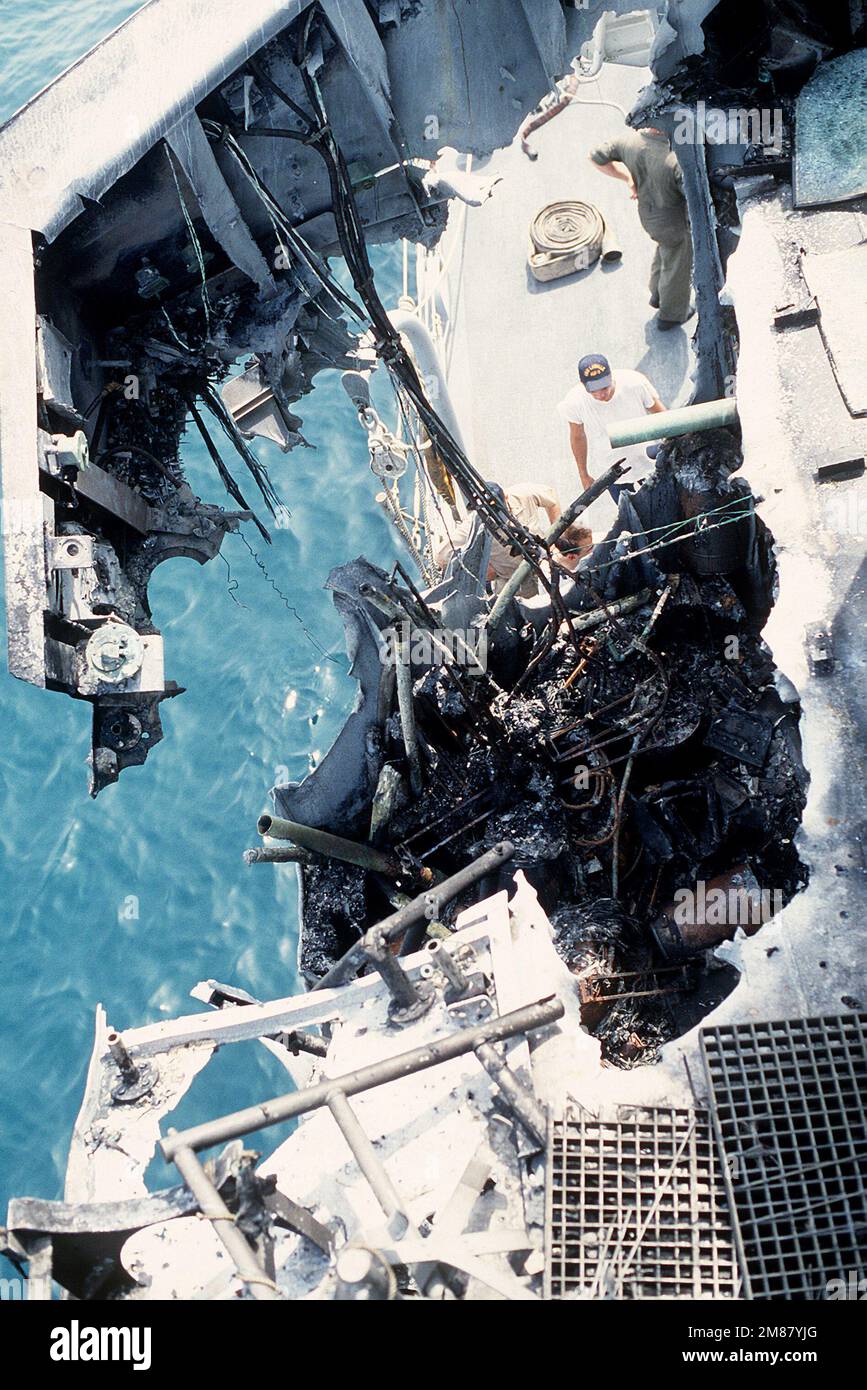 A close-up view of damage to the guided missile frigate USS STARK (FFG ...