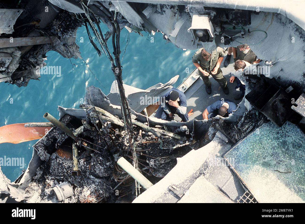 A close-up view of damage to the guided missile frigate USS STARK (FFG ...