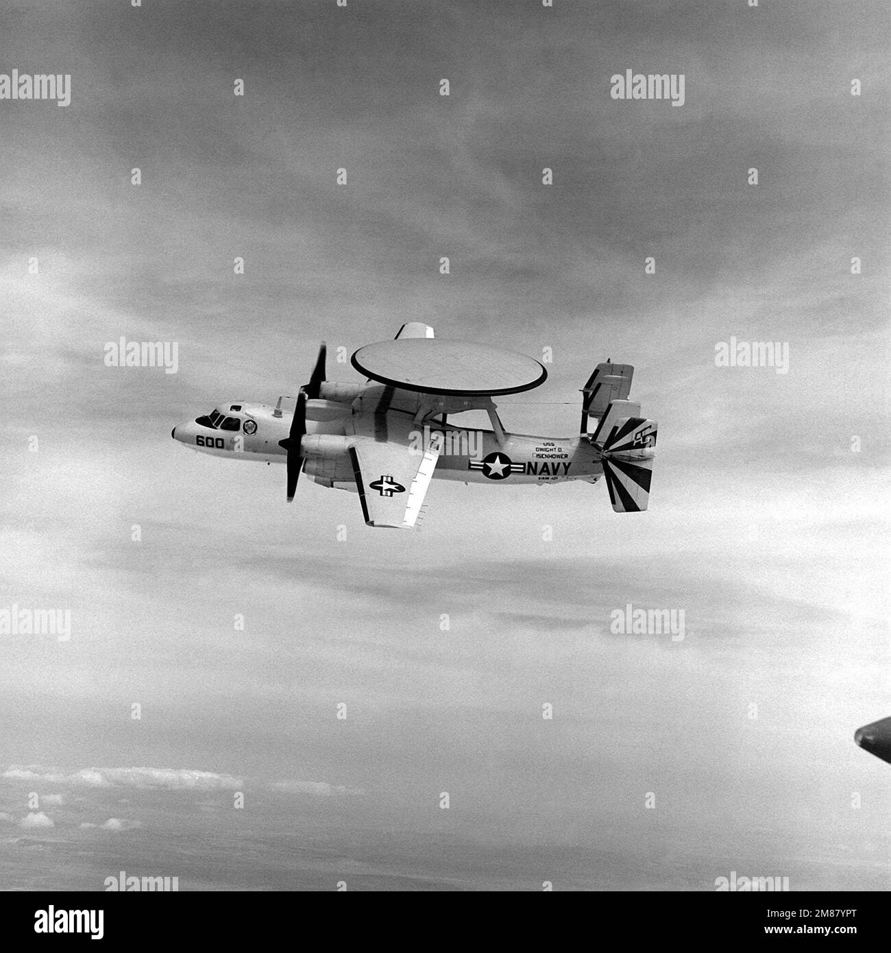 An air-to-air left side view of a Carrier Airborne Early Warning ...