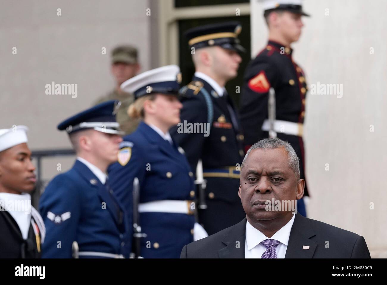 Defense Secretary Lloyd Austin waits for the arrival of Japanese ...