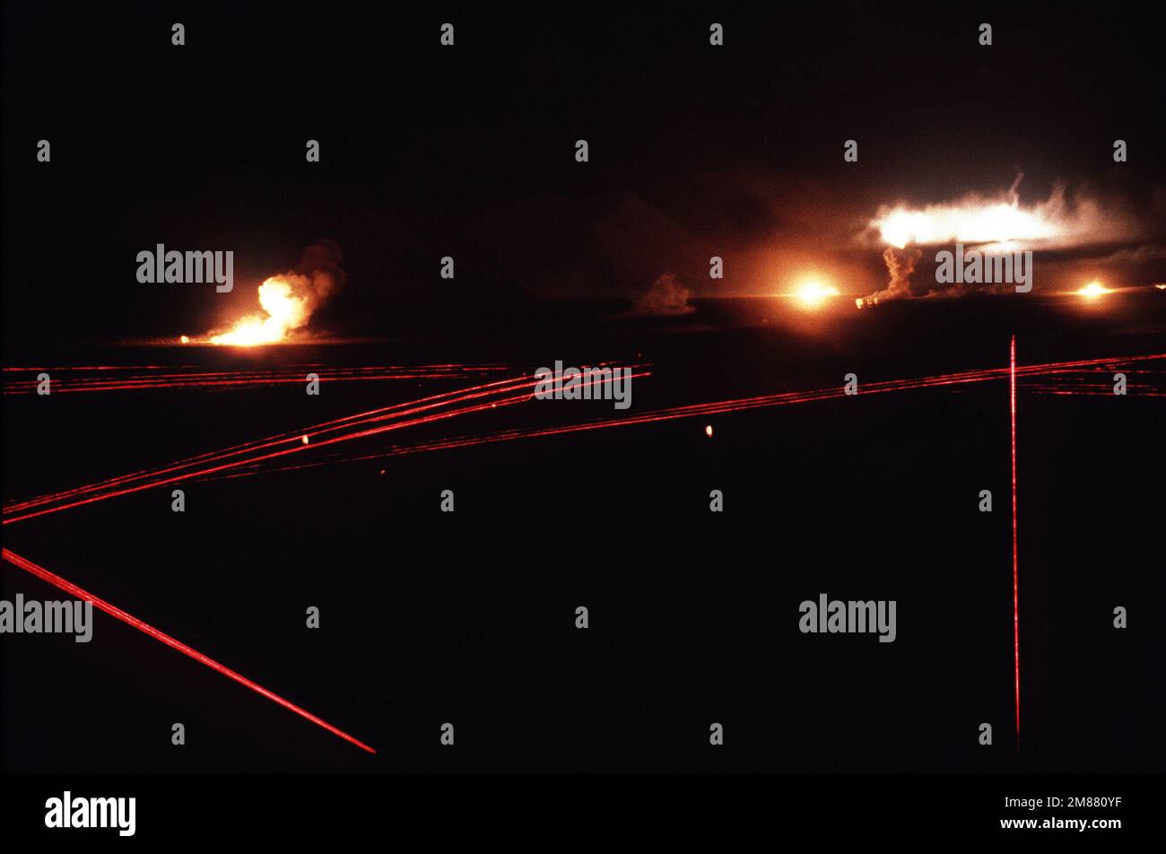 A night fire fight during a combined arms exercise. Country: Unknown ...