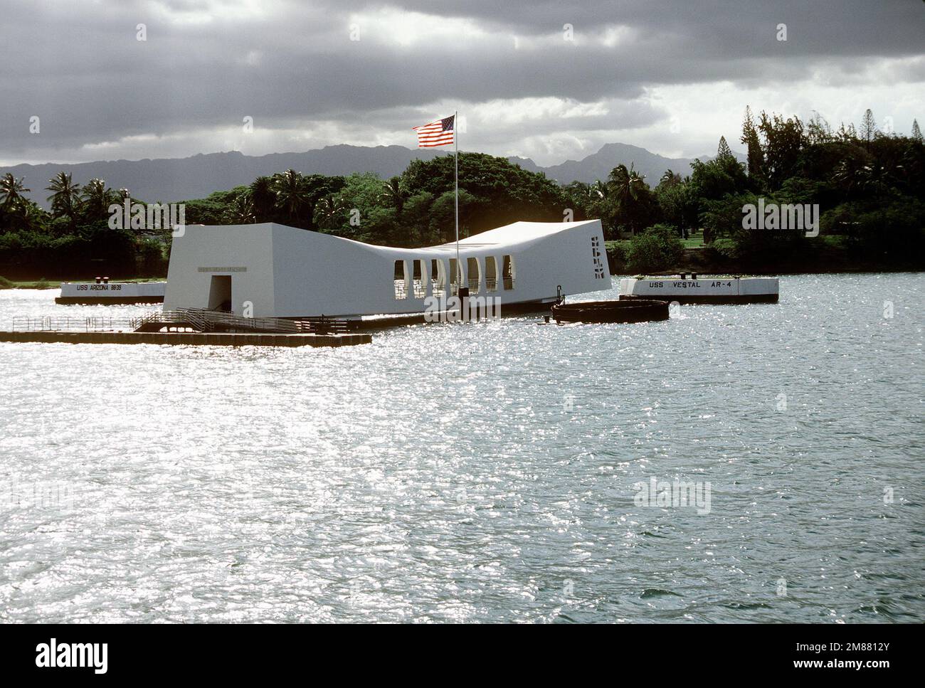A view of the USS ARIZONA Memorial which spans the sunken hull of the ...