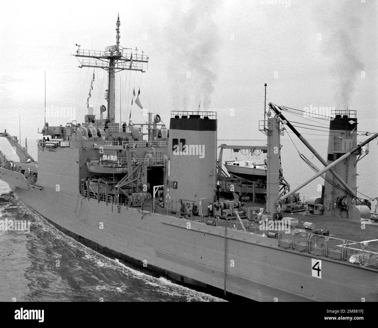 A port view of the tank landing ship USS BARNSTABLE COUNTY (LST-1197 ...