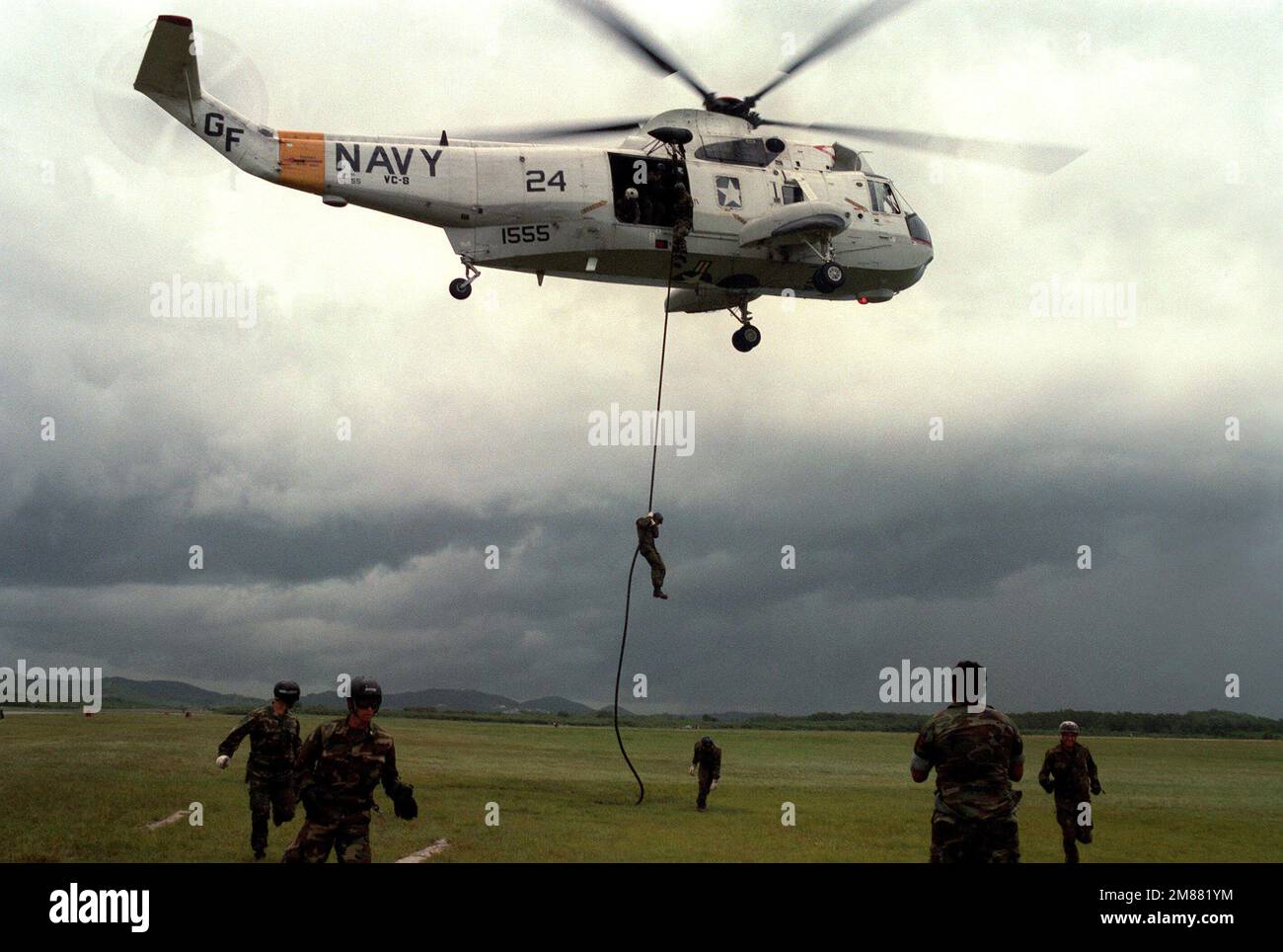 US Navy Sea-Air-Land (SEAL) team members and their Brazilian ...