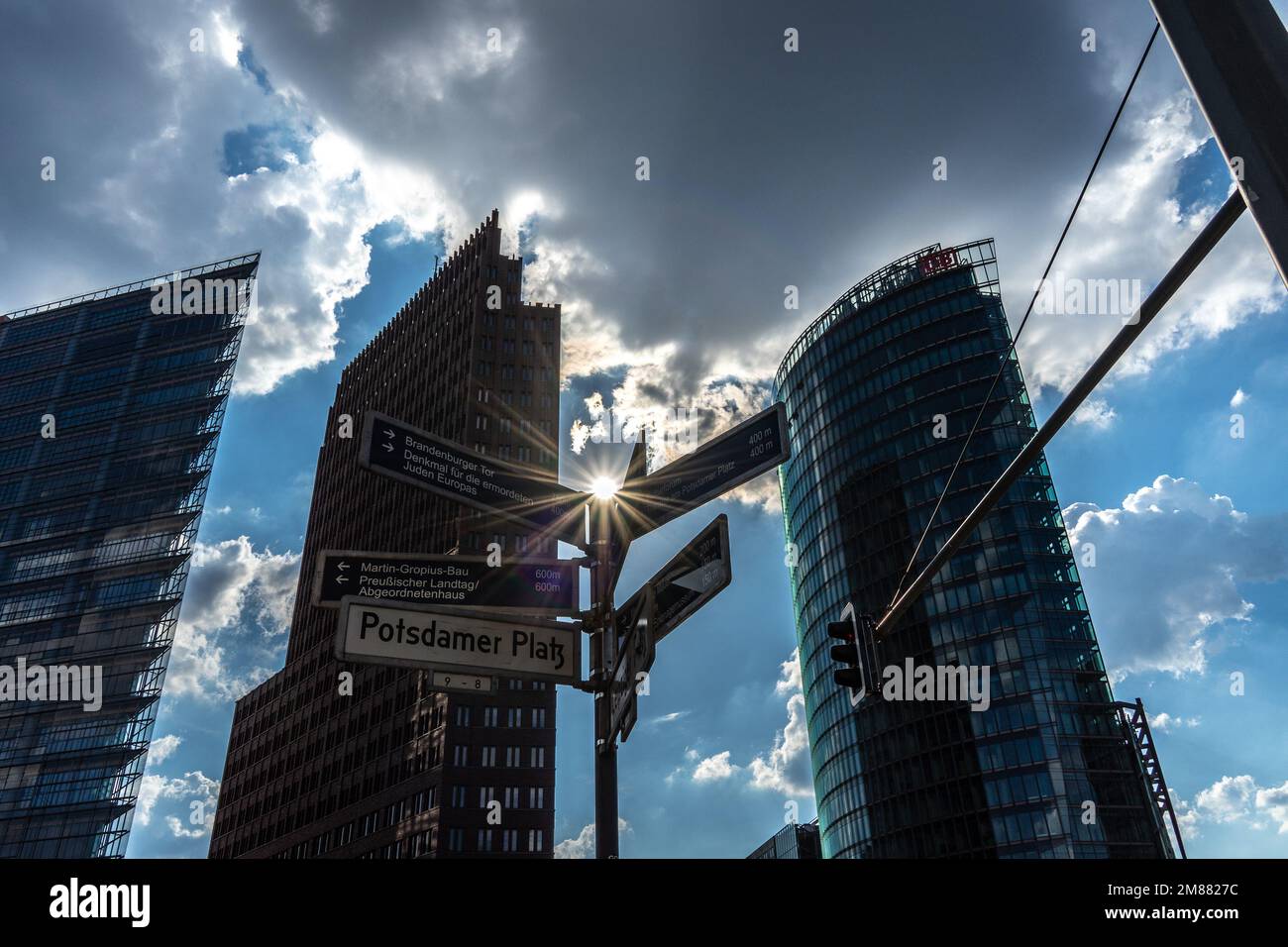 Berlin, Germany - June 26 2022: Street direction signs with skyscrapers ...