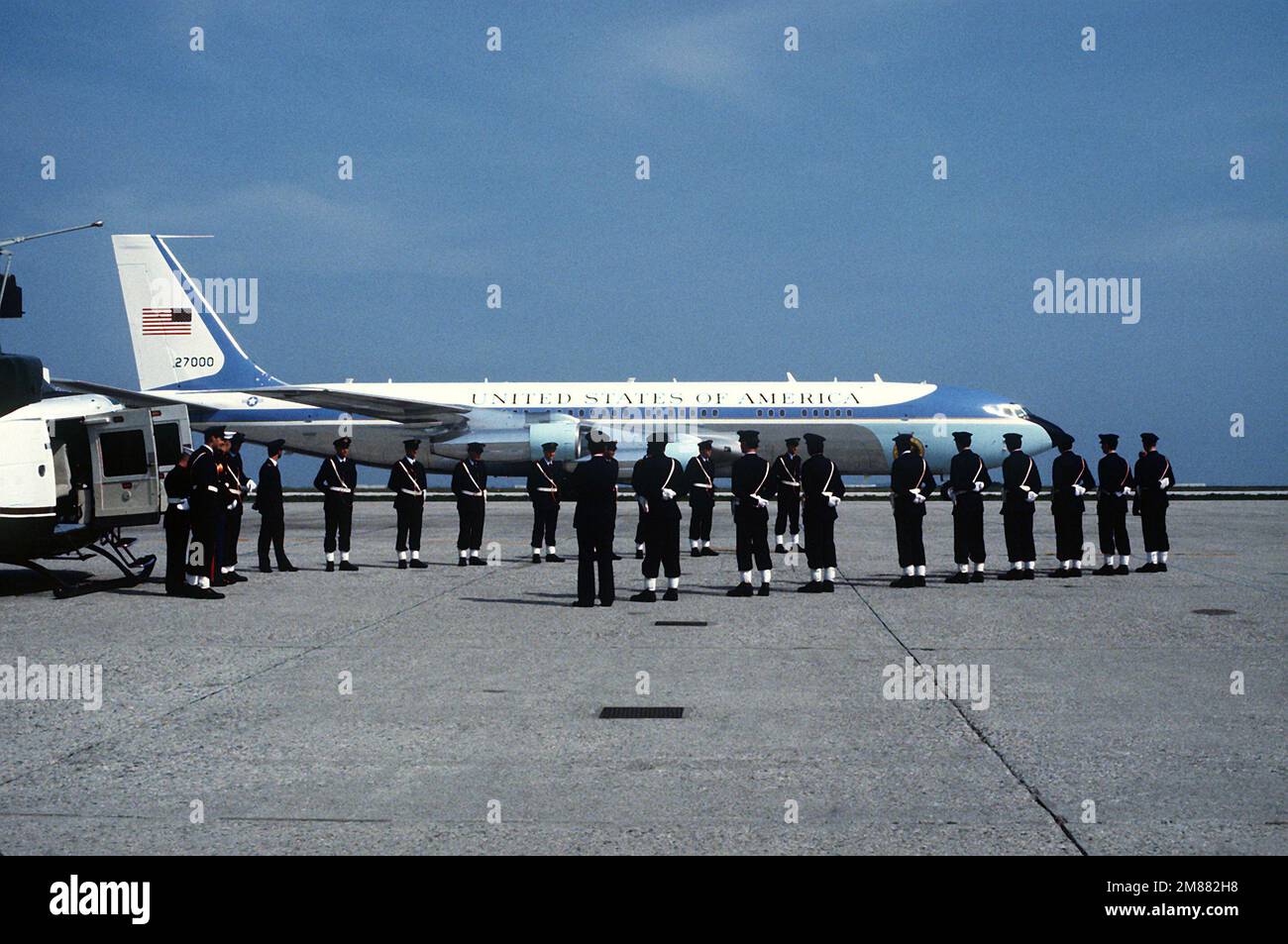 An Italian honor guard stands in formation on the tarmac at the Marco ...