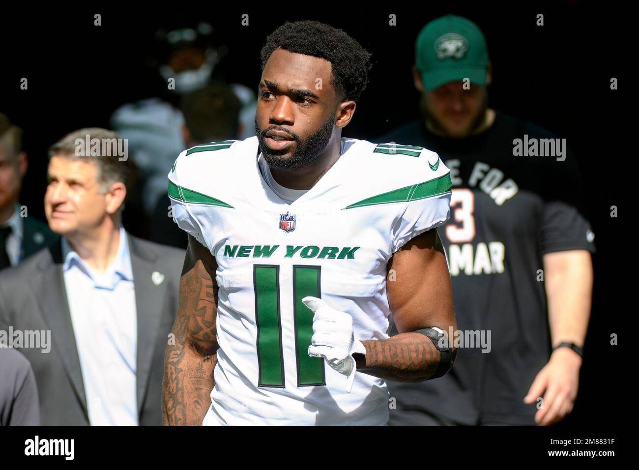 New York Jets wide receiver Denzel Mims (11) walks onto the field ...