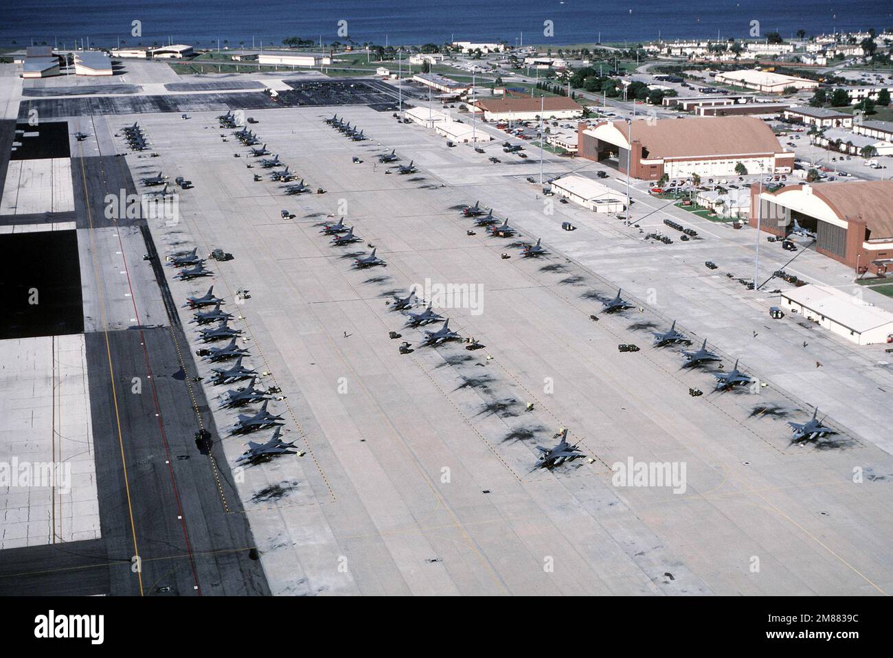 An aerial view of F-16 Fighting Falcon aircraft parked on the flight ...