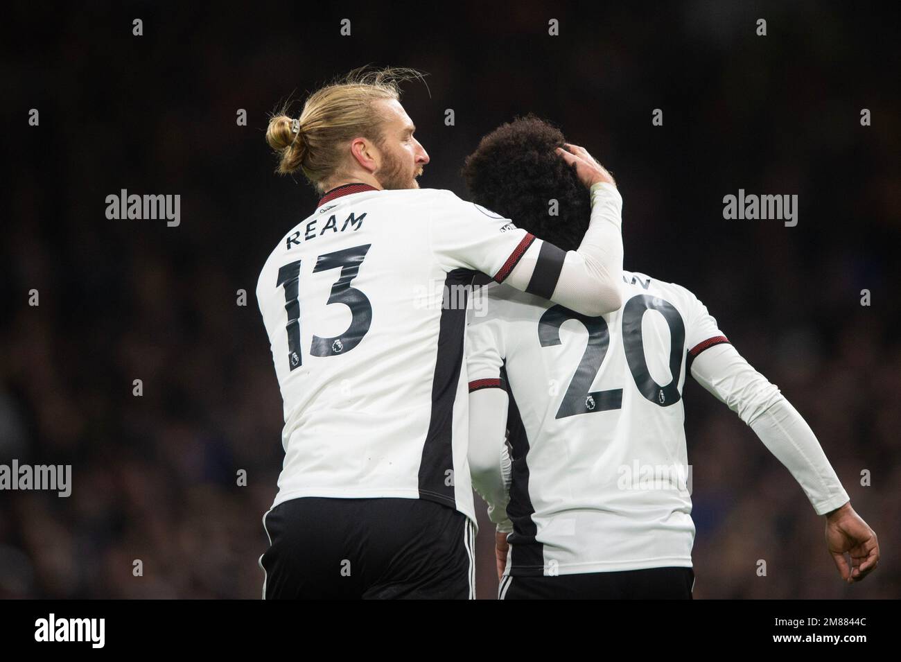 London, UK. 12th Jan, 2023. Tim Ream of Fulham celebrates with Willian ...