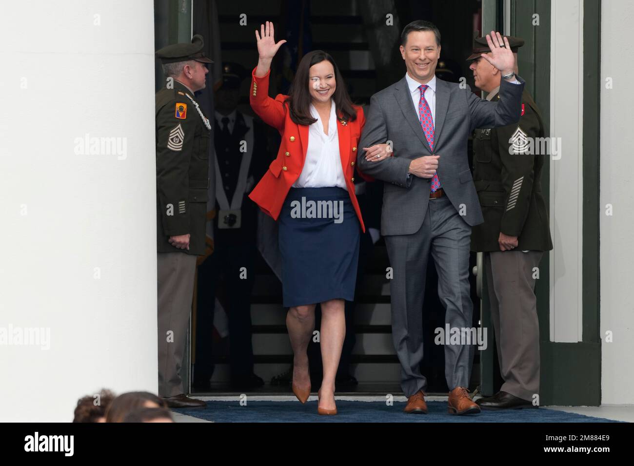 Florida Attorney General Ashley Moody, left, arrives with her husband Justin Duralia for an ...