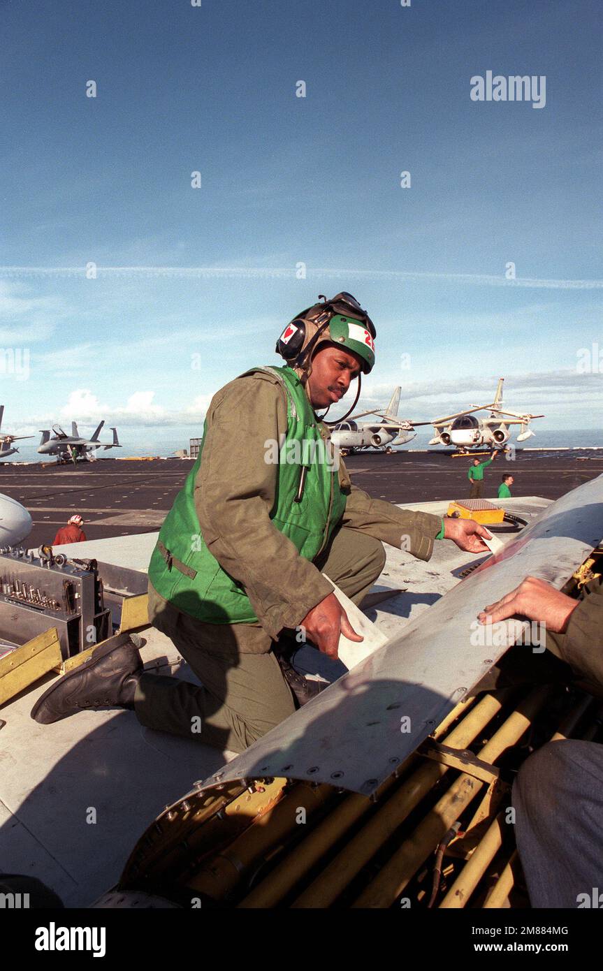 Aviation Electrician's Mate 1ST Class Thomas performs routine ...