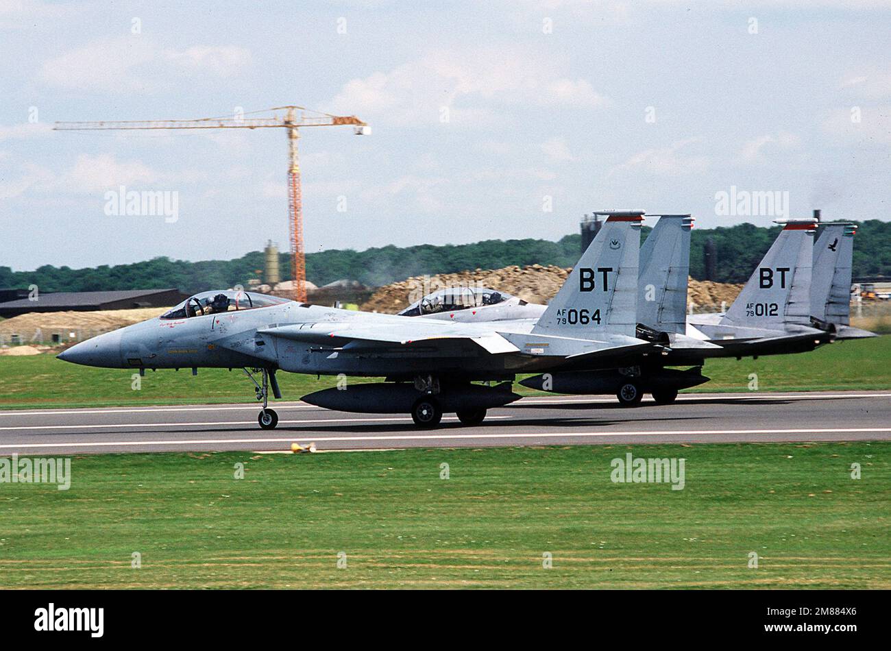 An F-15C and an F-15D Eagle aircraft of the 22nd Tactical Fighter ...