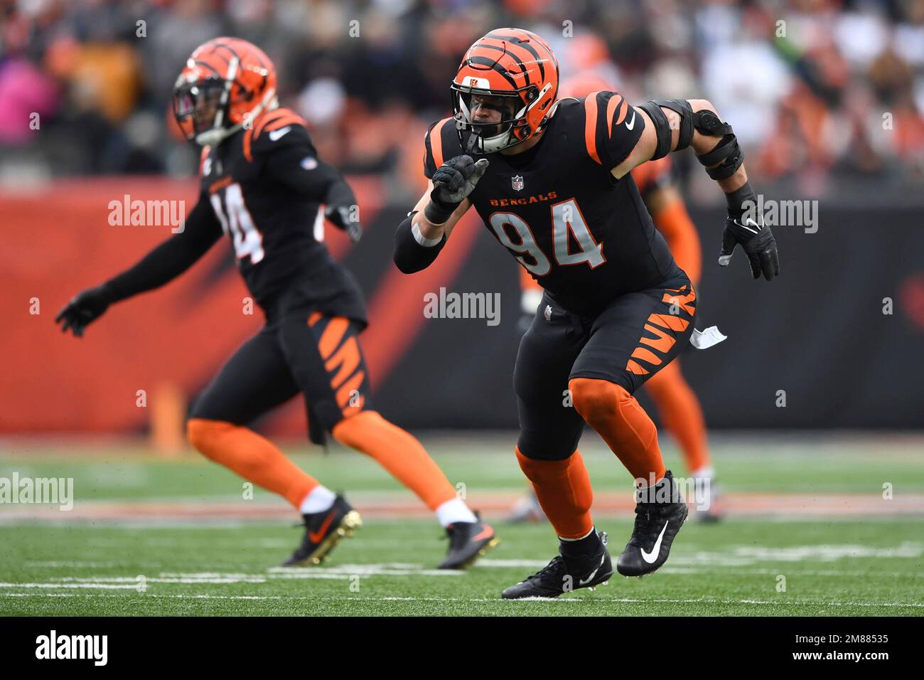Cincinnati Bengals defensive end Sam Hubbard (94) runs for the play ...