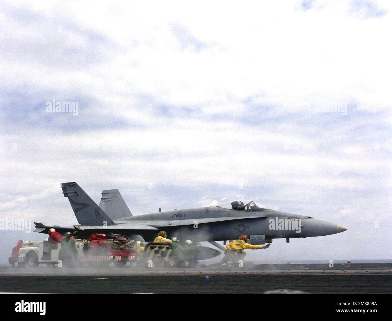 A Strike Fighter Squadron 137 (VFA-137) F/A-18A Hornet aircraft is ...
