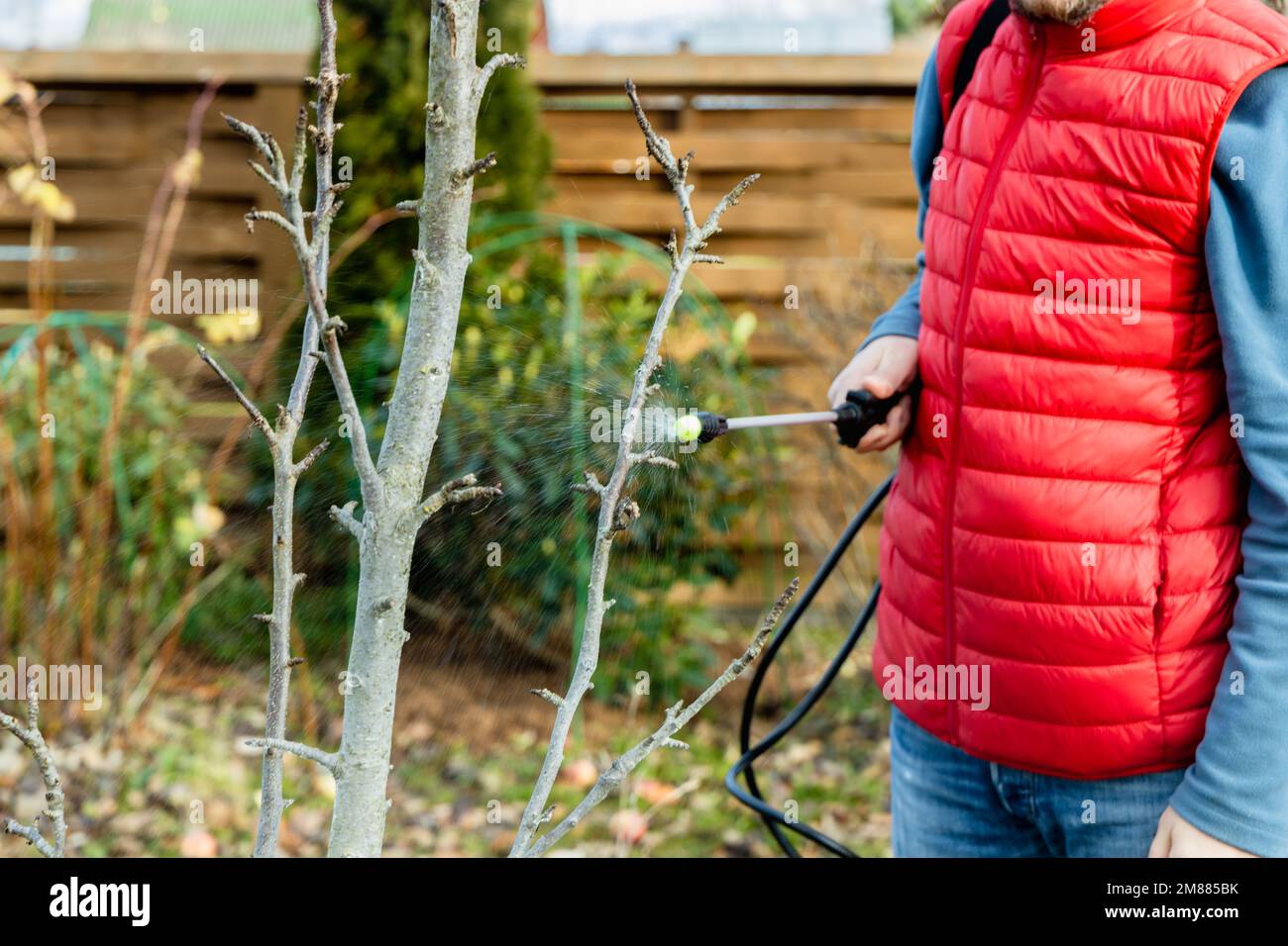 Spraying fruit trees pump hi-res stock photography and images - Alamy