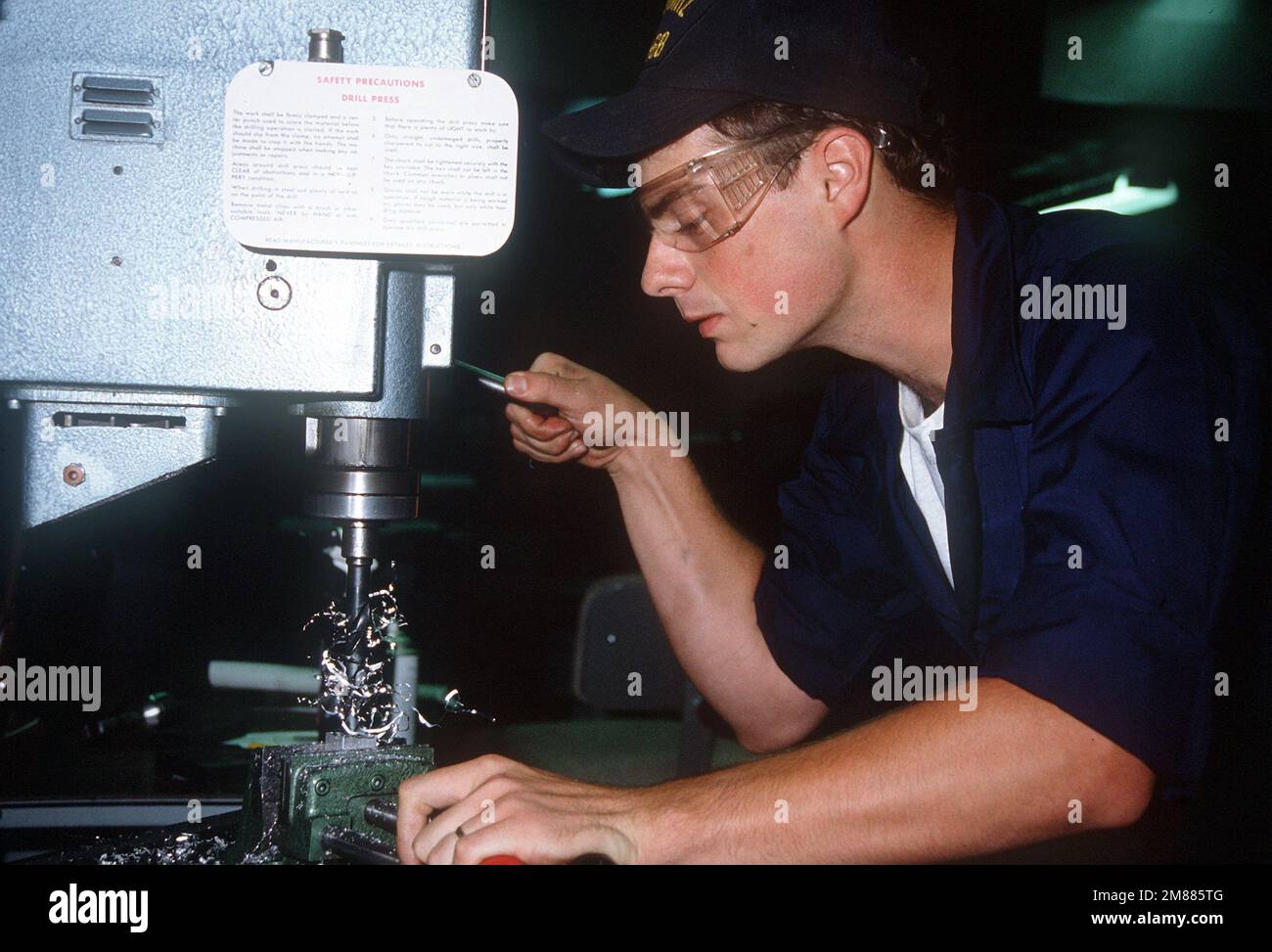 Aviation Structural Mechanic S (Structures) AIRMAN E. Spicuzza uses a ...