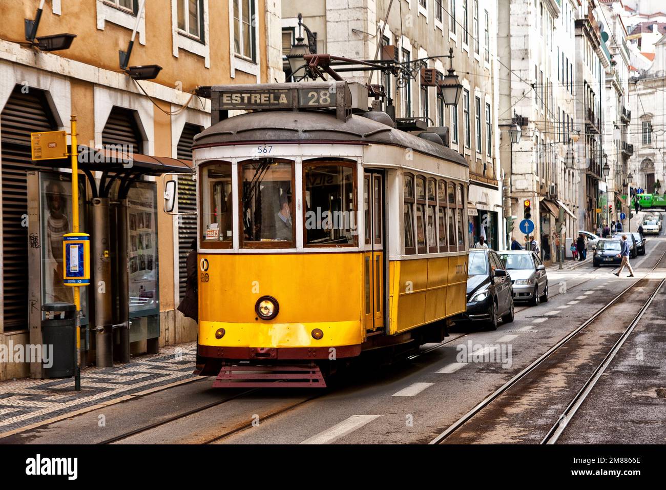 Historic tram / metro / Eletrico on the road in the city of Lisbon ...