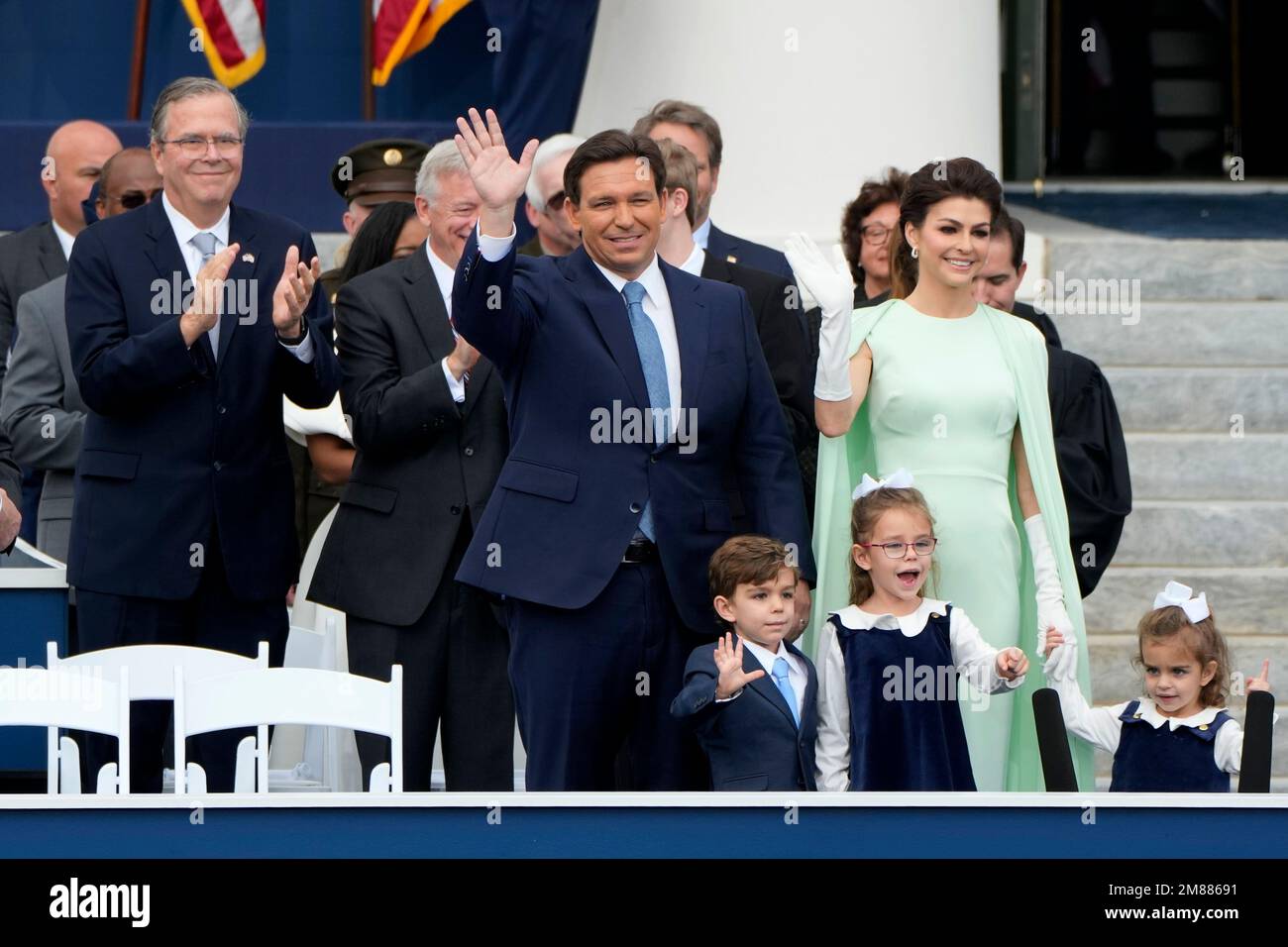 Florida Gov. Ron DeSantis, left, stands with his wife Casey, right, and ...