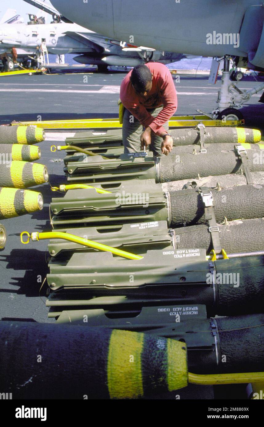 A ordnanceman of Attack Squadron 165 (VA-165) inspects Mark 82 500 ...