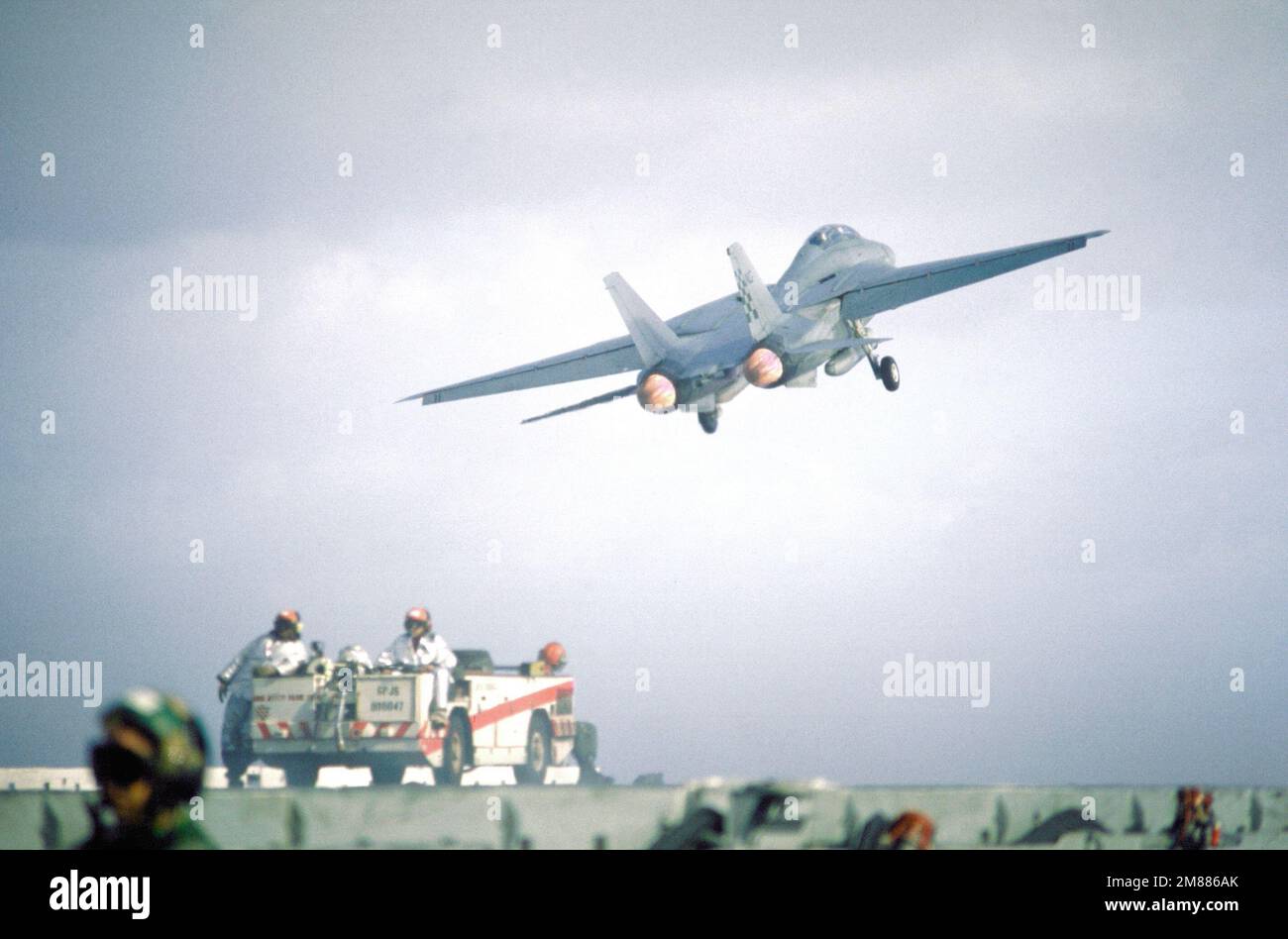 A Fighter Squadron 211 (VF-211) F-14A Tomcat is launched from the ...