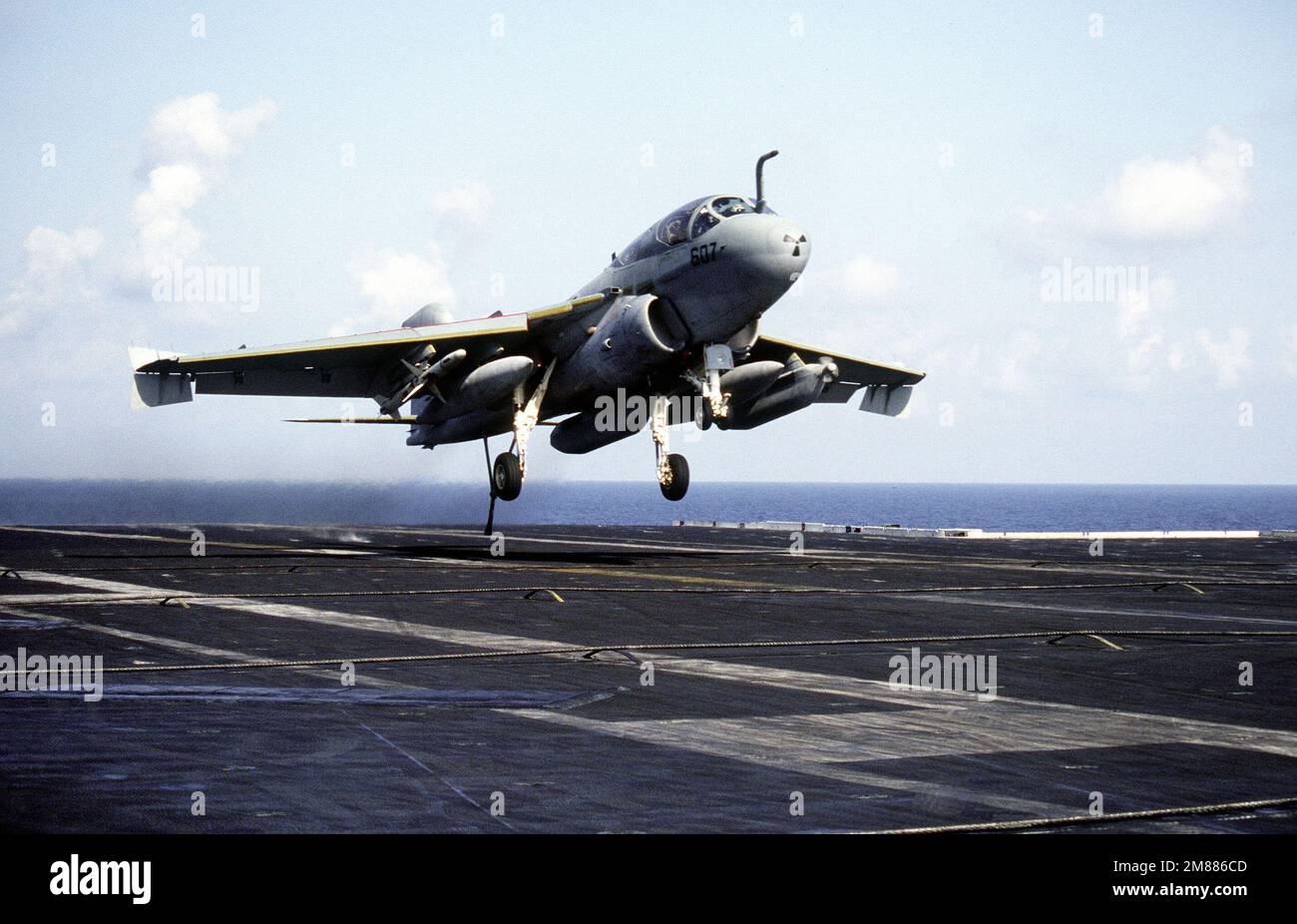An EA-6B Prowler aircraft prepares to land on the flight deck of the ...