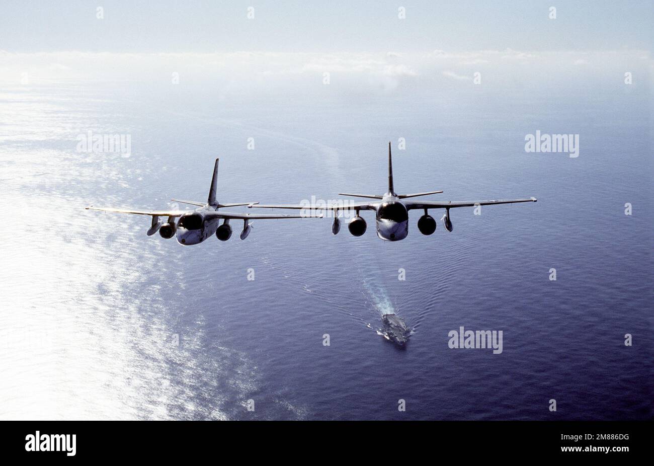 An air-to-air front view of two S-3A Viking aircraft in formation with ...