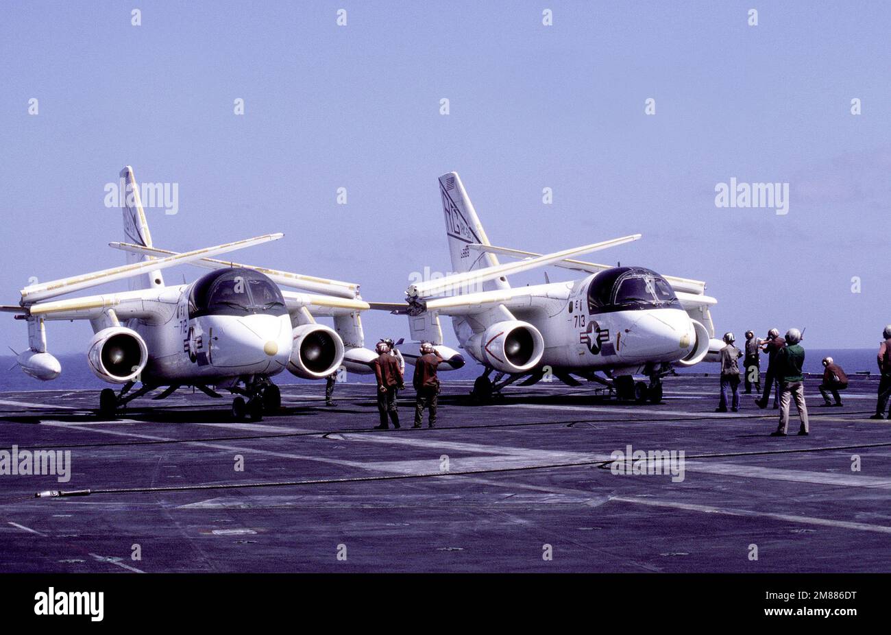 Two US-3A Viking aircraft are parked on the flight deck of the aircraft ...