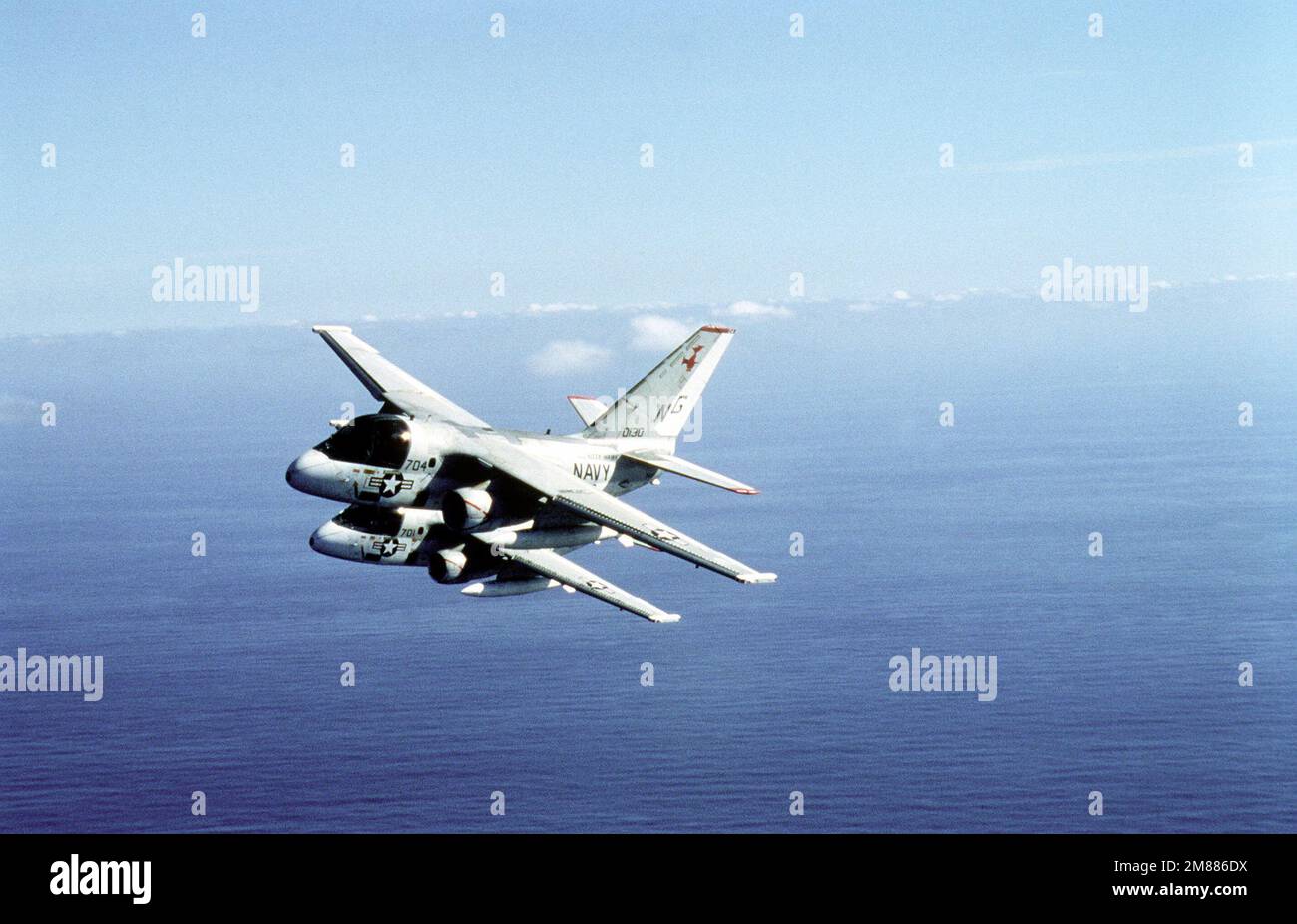An air-to-air left side view of two S-3A Viking aircraft flying in ...