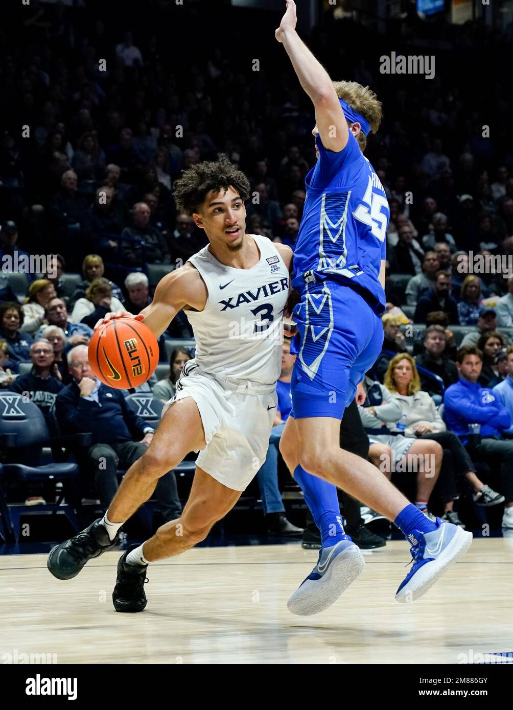 Xavier guard Colby Jones (3) drives to the basket against Creighton's ...