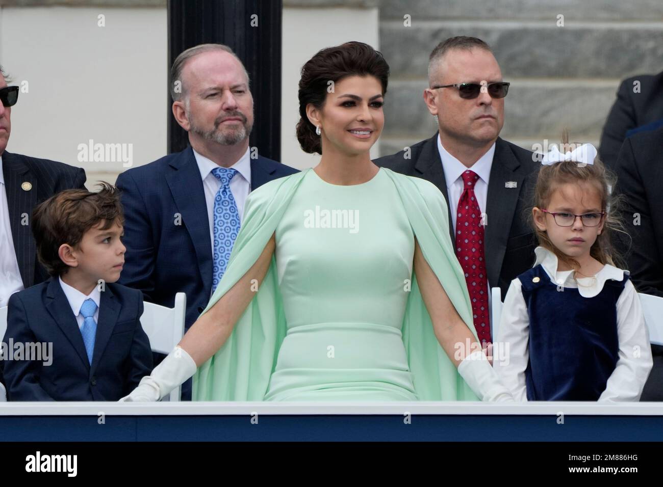 Casey DeSantis stands with her children Mason, left, and Madison ...