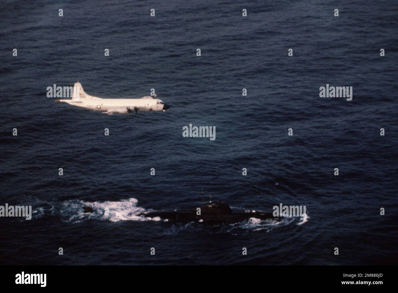 An air-to-air right side view of a Patrol Squadron 1 (VP-1) P-3 Orion ...
