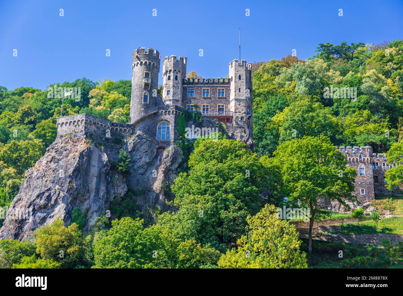 A view of the exterior of the historic Rheinstein castle and ...
